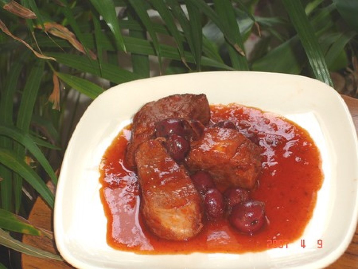 Filet pûr de porc au porto rouge, cerises, et tomate - Recette Ptitchef
