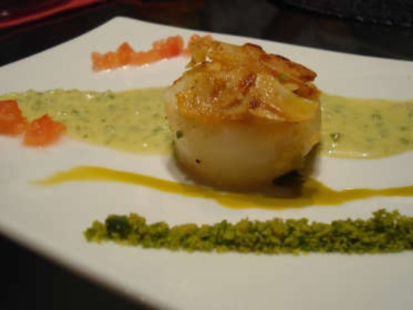 Recette de noix de saint-jacques rôties aux amandes